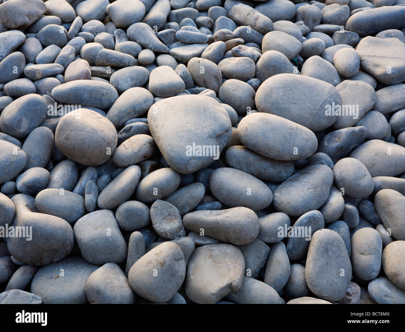 Close up of the pebbles on the beach at Sandy Mouth North Cornwall UK ...