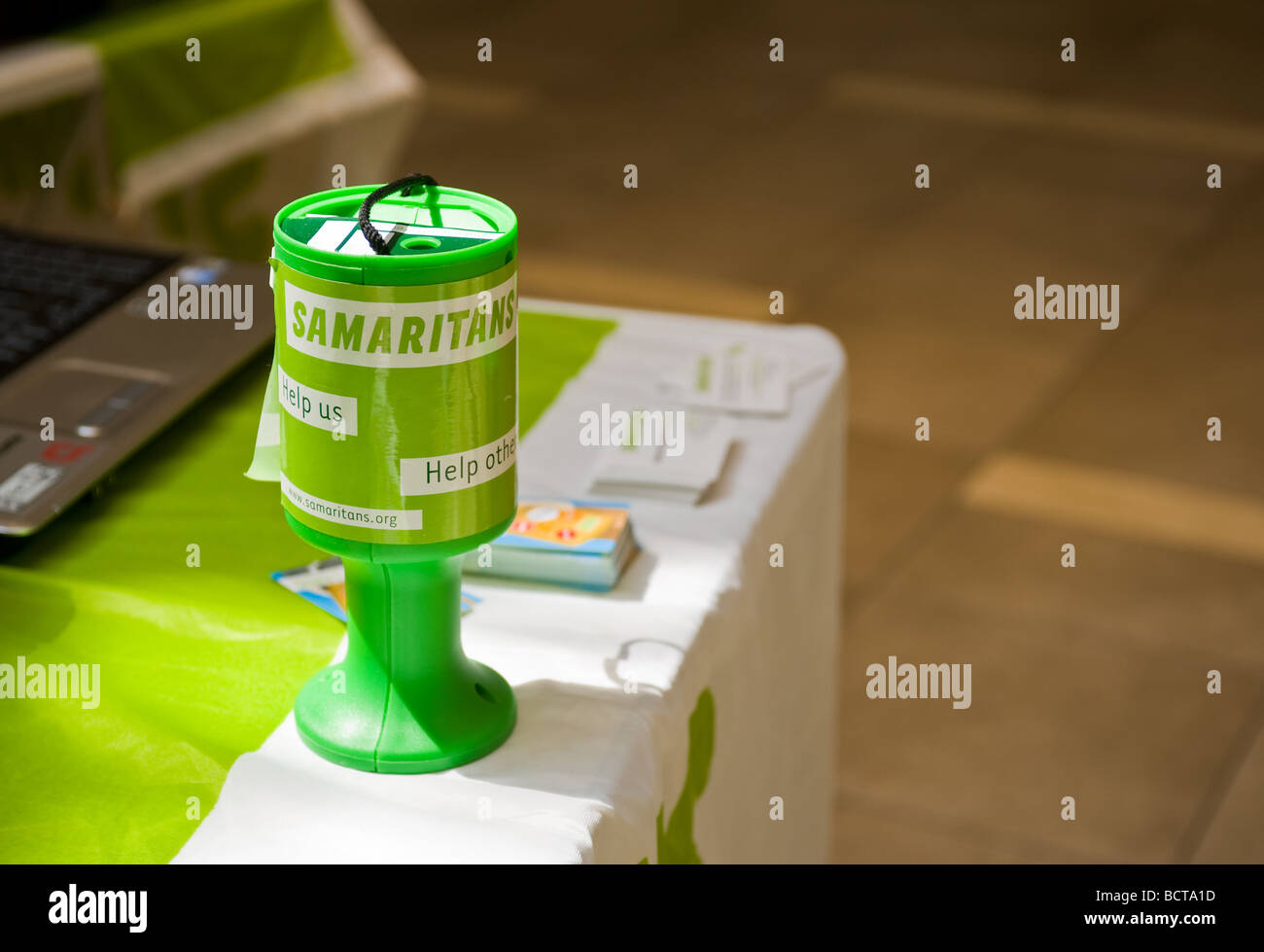 A collecting box for the charity The Samaritans Stock Photo - Alamy