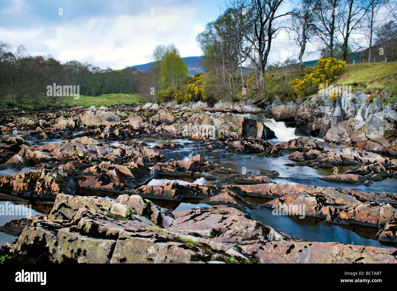 River Carron along rocky patch of river taken along single track road ...