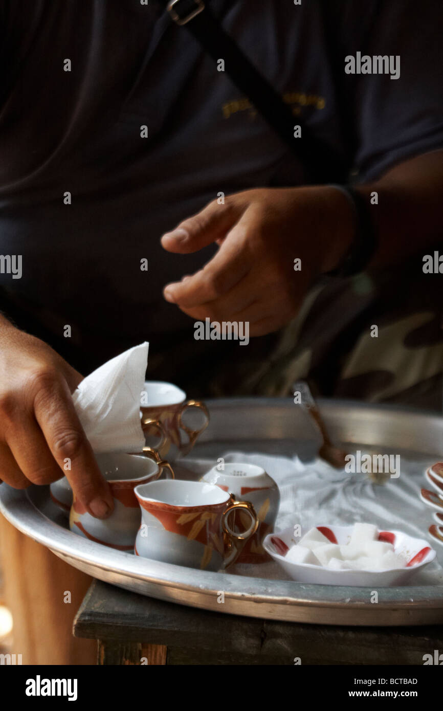 A turkish man served handmade turkish coffee Stock Photo - Alamy