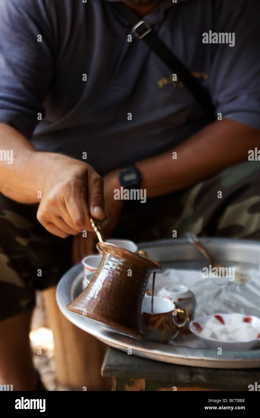 A turkish man served handmade turkish coffee Stock Photo - Alamy