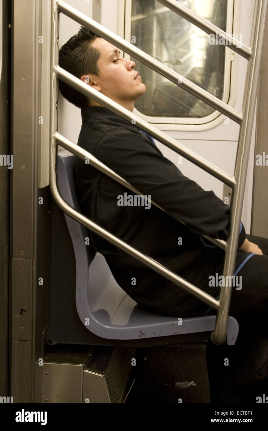 Tired man sitting subway hi-res stock photography and images - Alamy