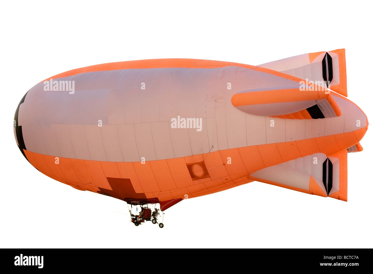 flying orange blimp isolated on white background Stock Photo - Alamy