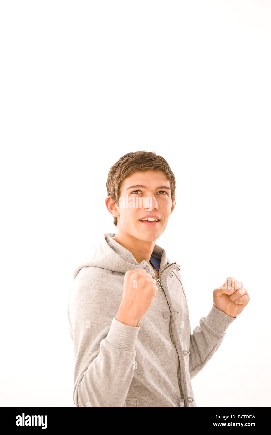 Portrait of a boy in victory pose Stock Photo - Alamy