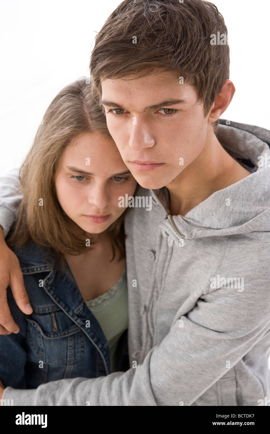 Boy embracing his girlfriend Stock Photo - Alamy