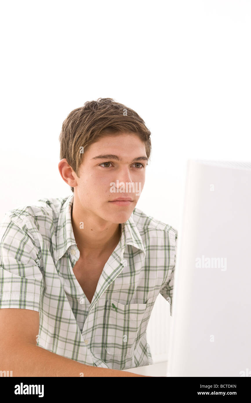 Boy working on his computer Stock Photo - Alamy