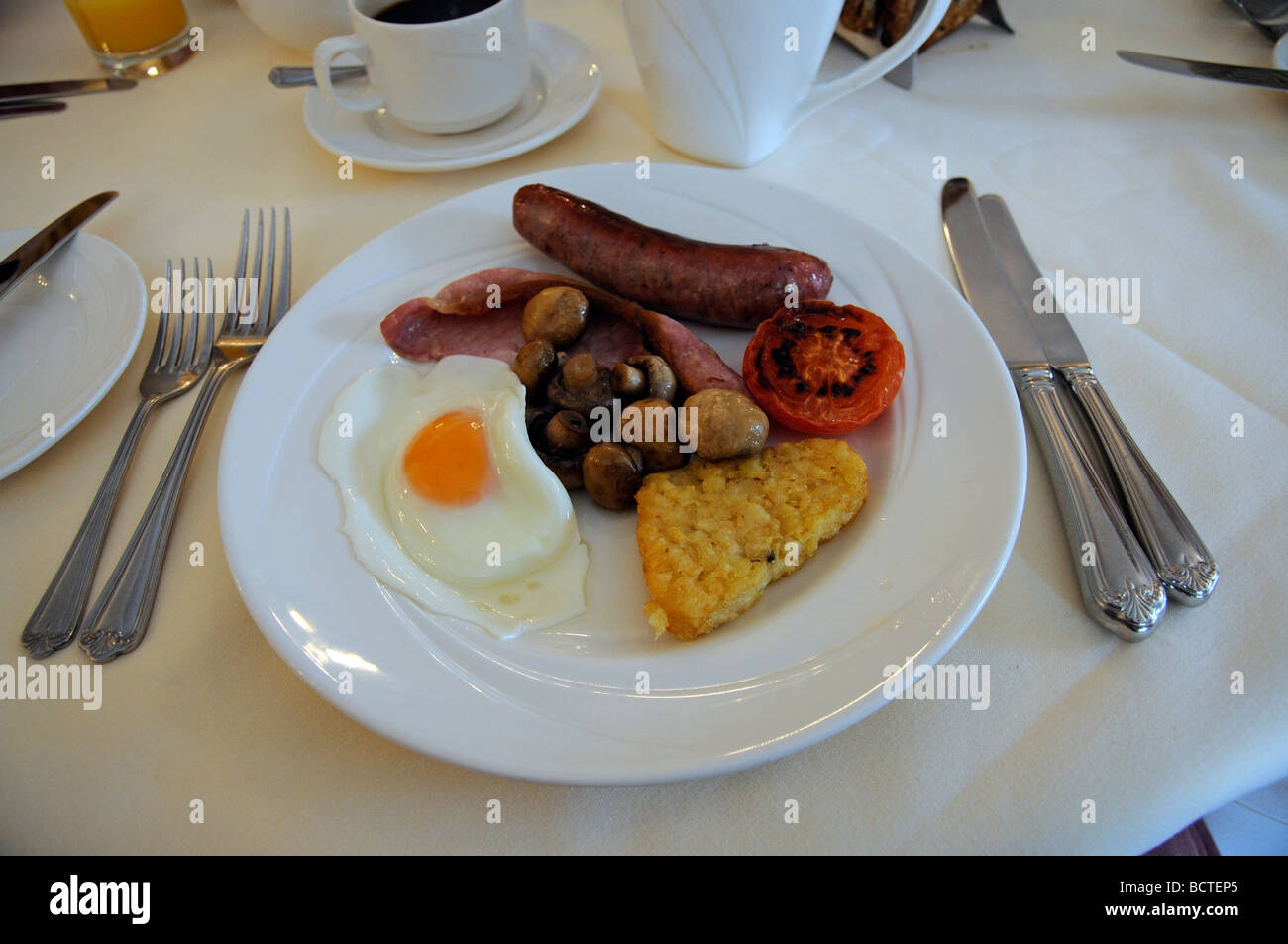 English breakfast on a plate with toast and coffee pot Stock Photo - Alamy