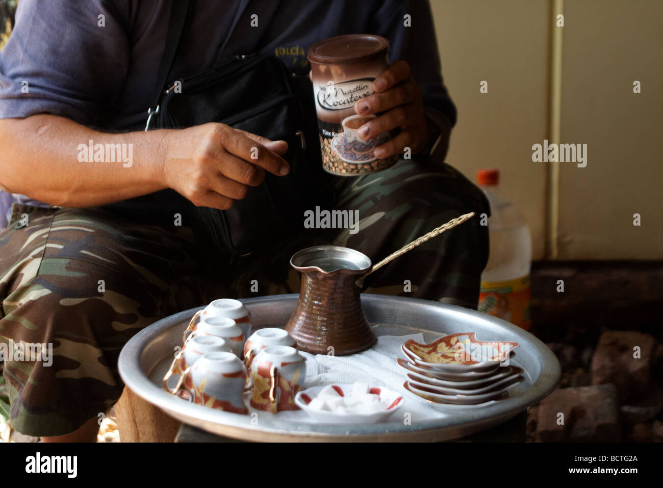 A turkish man served handmade turkish coffee Stock Photo - Alamy