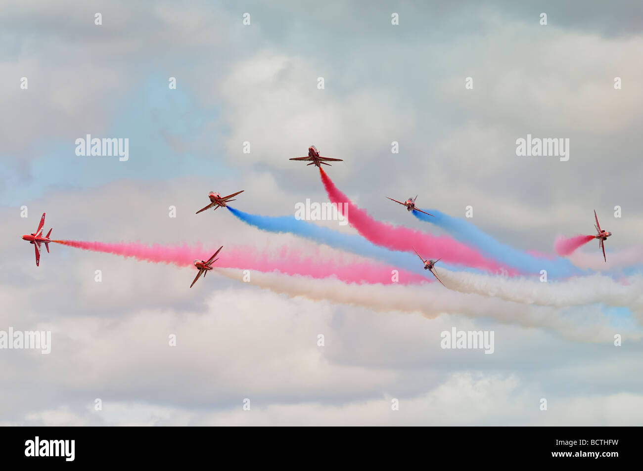The Red Arrows break formation as they display at the Royal ...