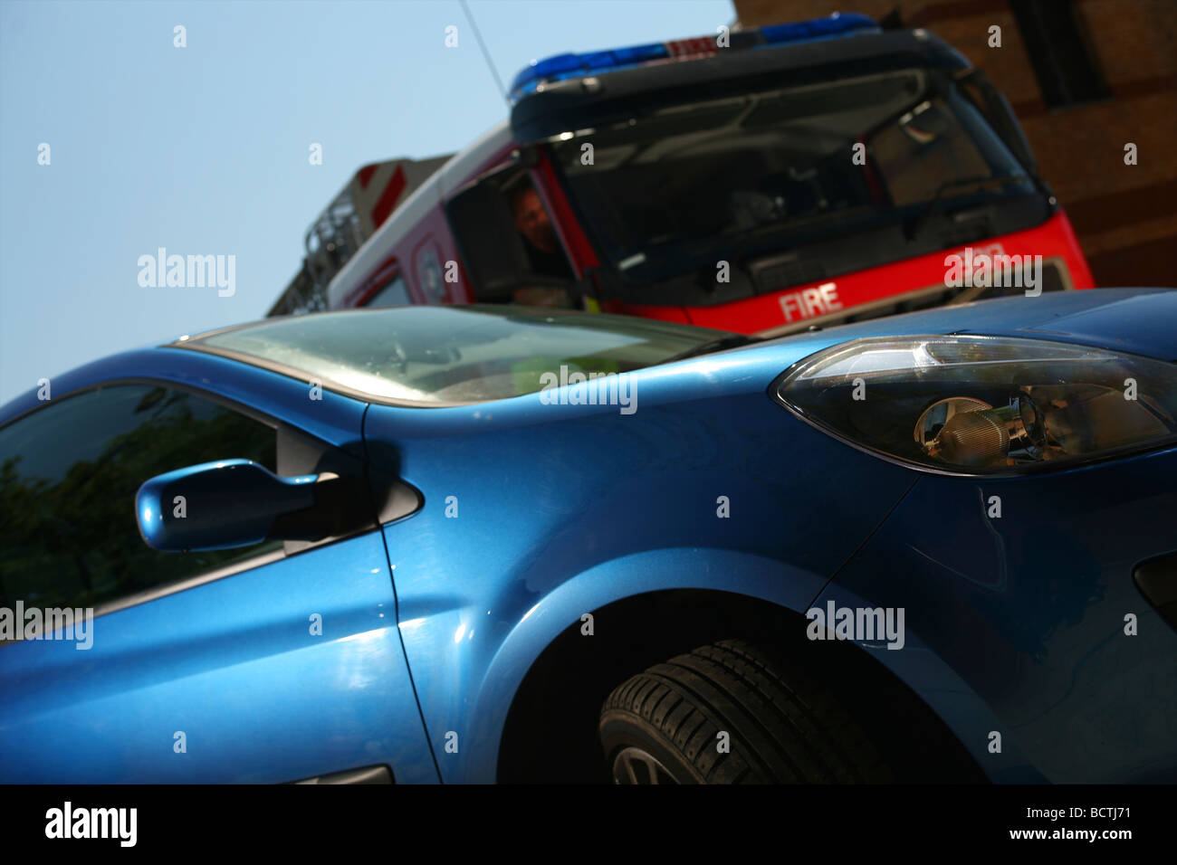 A fire engine on the way to a call Stock Photo - Alamy