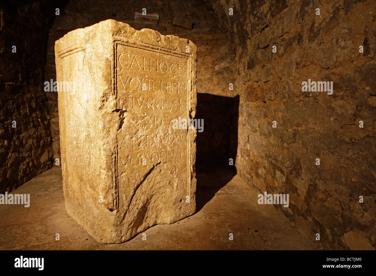 Latin inscription on a block of stone in the Ancienne Cathedrale Ste ...