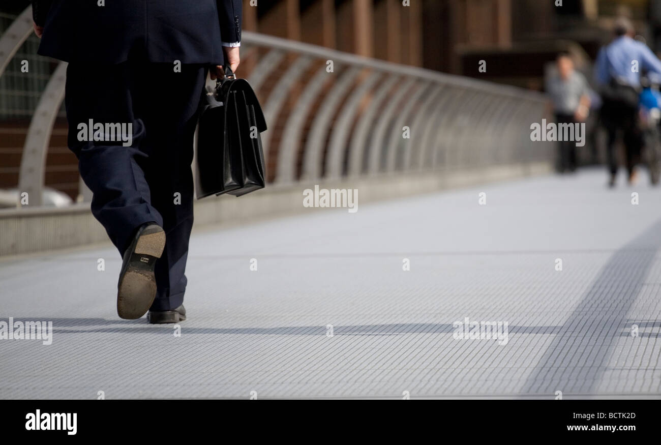 people crossing the Millennium Bridge Stock Photo - Alamy