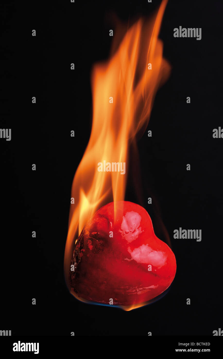 Iconic image of a burning heart Stock Photo - Alamy