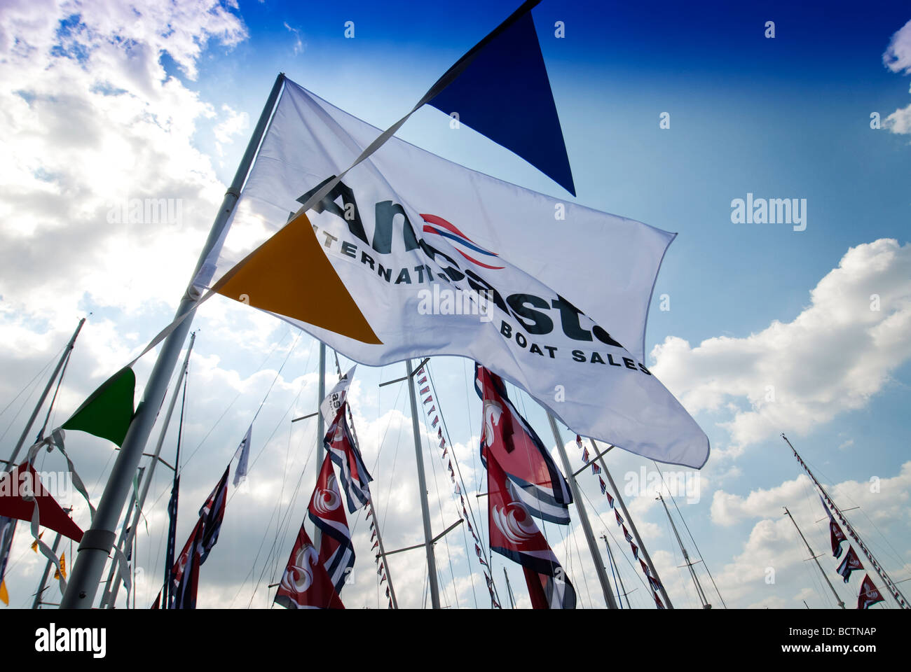 flags flying at a boat show Stock Photo - Alamy