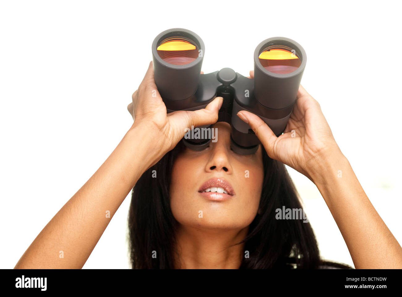 Indian businesswoman looking through binoculars hi-res stock ...