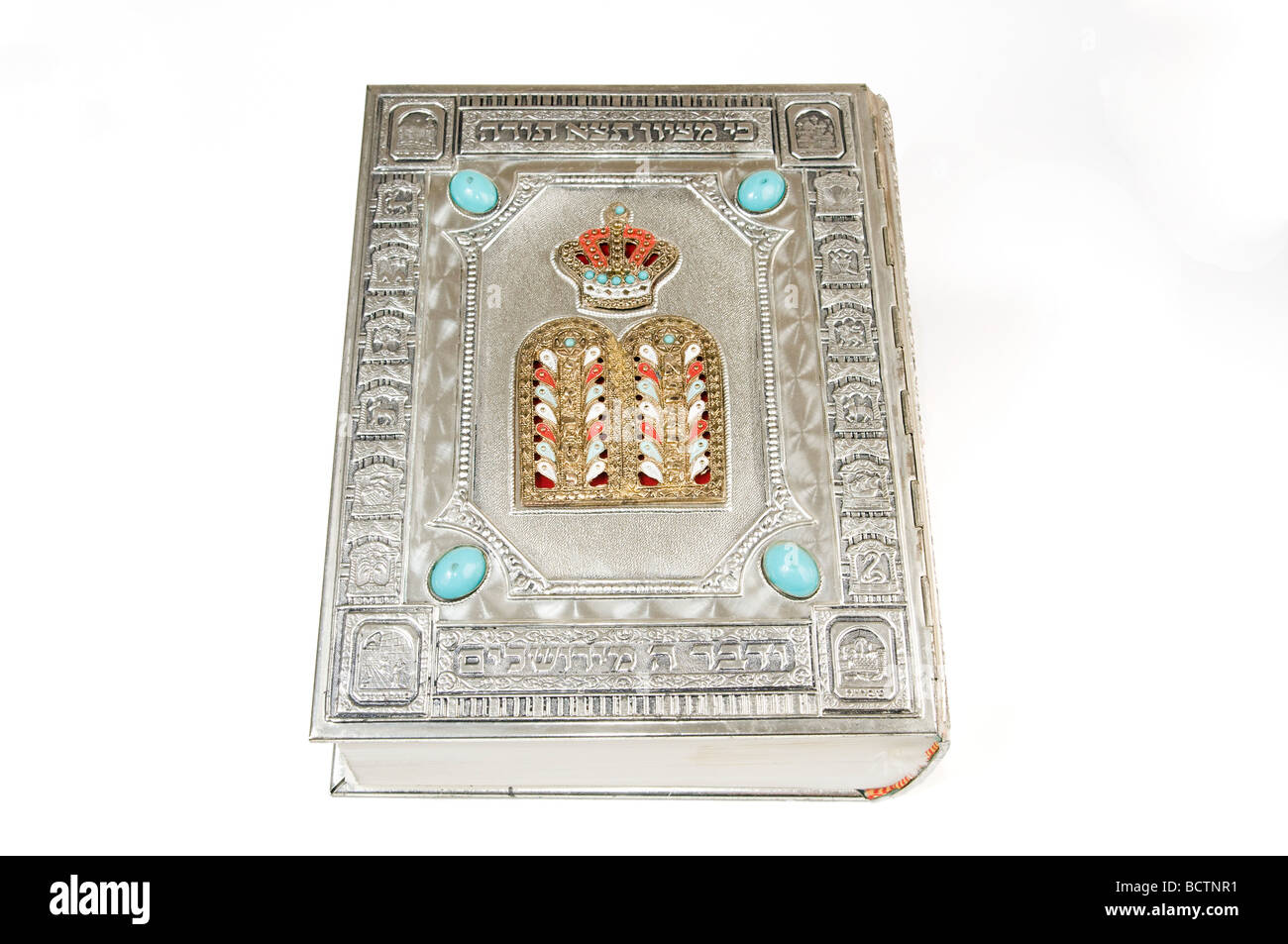 Cutout of a silver bound Holy Bible on white background Stock Photo - Alamy