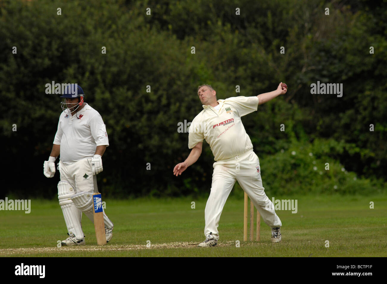 slow left-arm bowler in action Stock Photo - Alamy