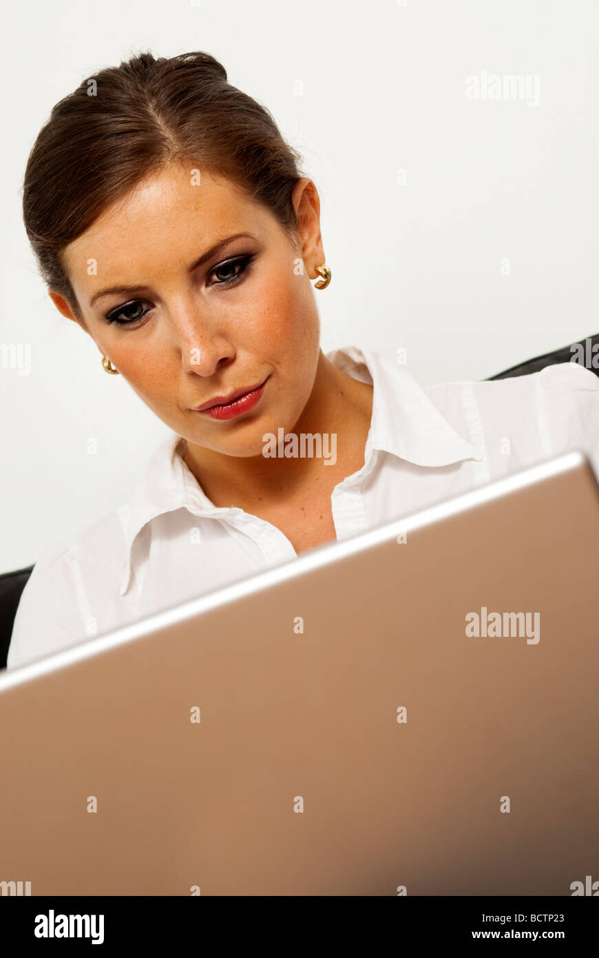woman working on her laptop computer Stock Photo - Alamy