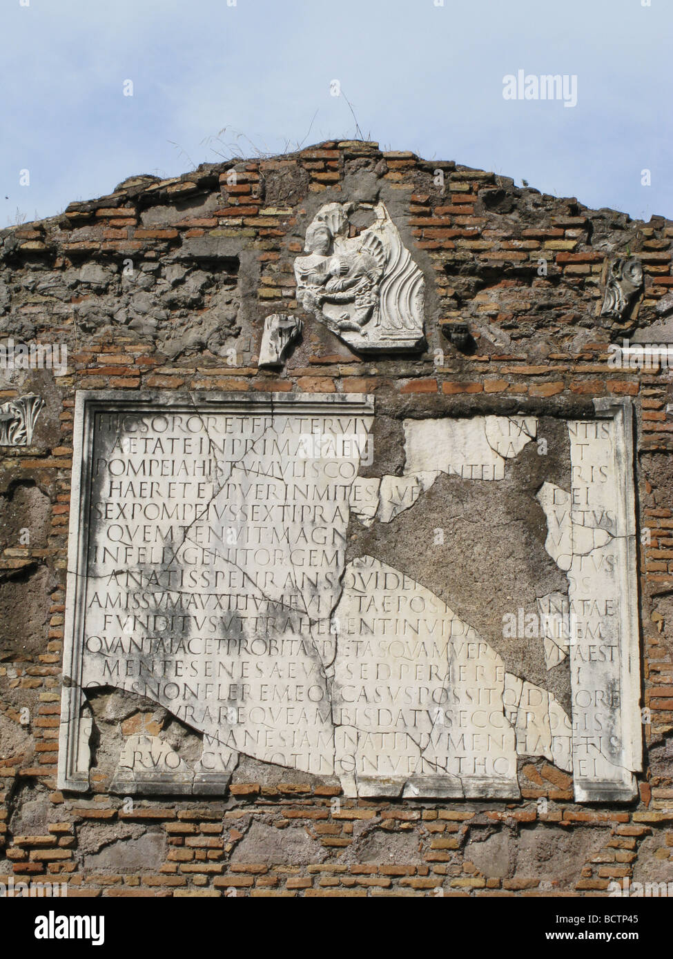 latin inscription on roman tomb on the old appian way in rome italy ...