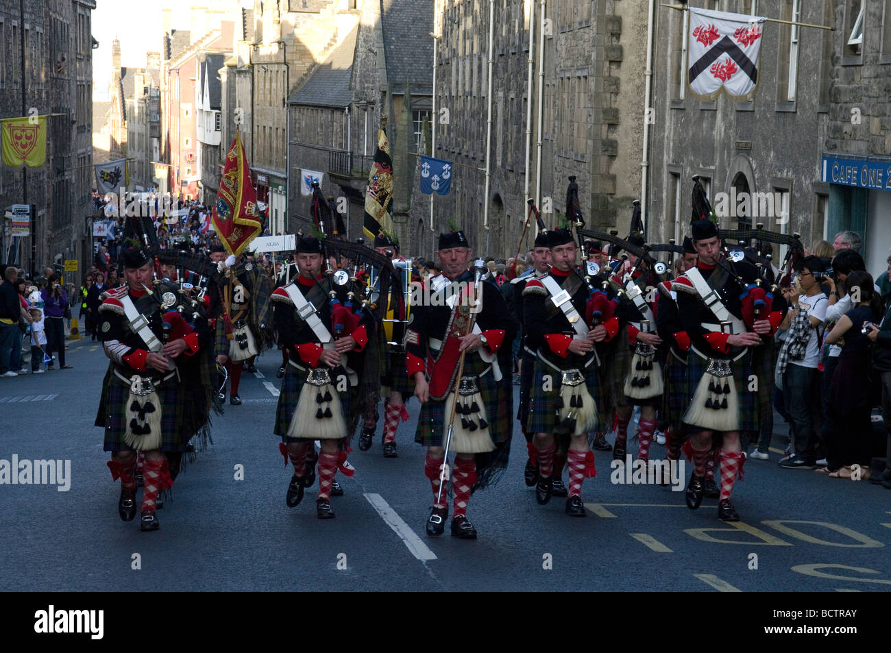 The Atholl Highlanders pipe band lead the Clan Parade up the Royal Mile ...