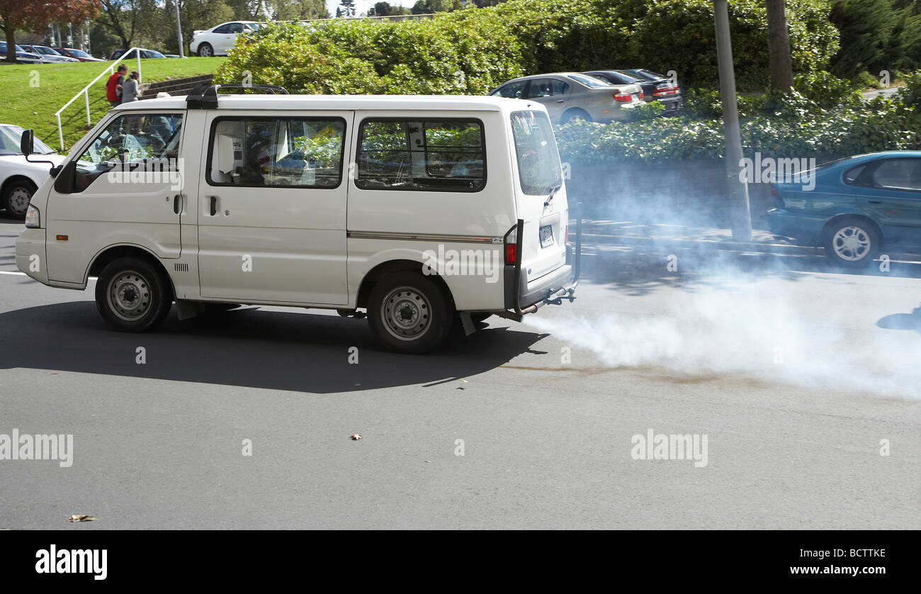 Van with Smokey Exhaust Stock Photo - Alamy
