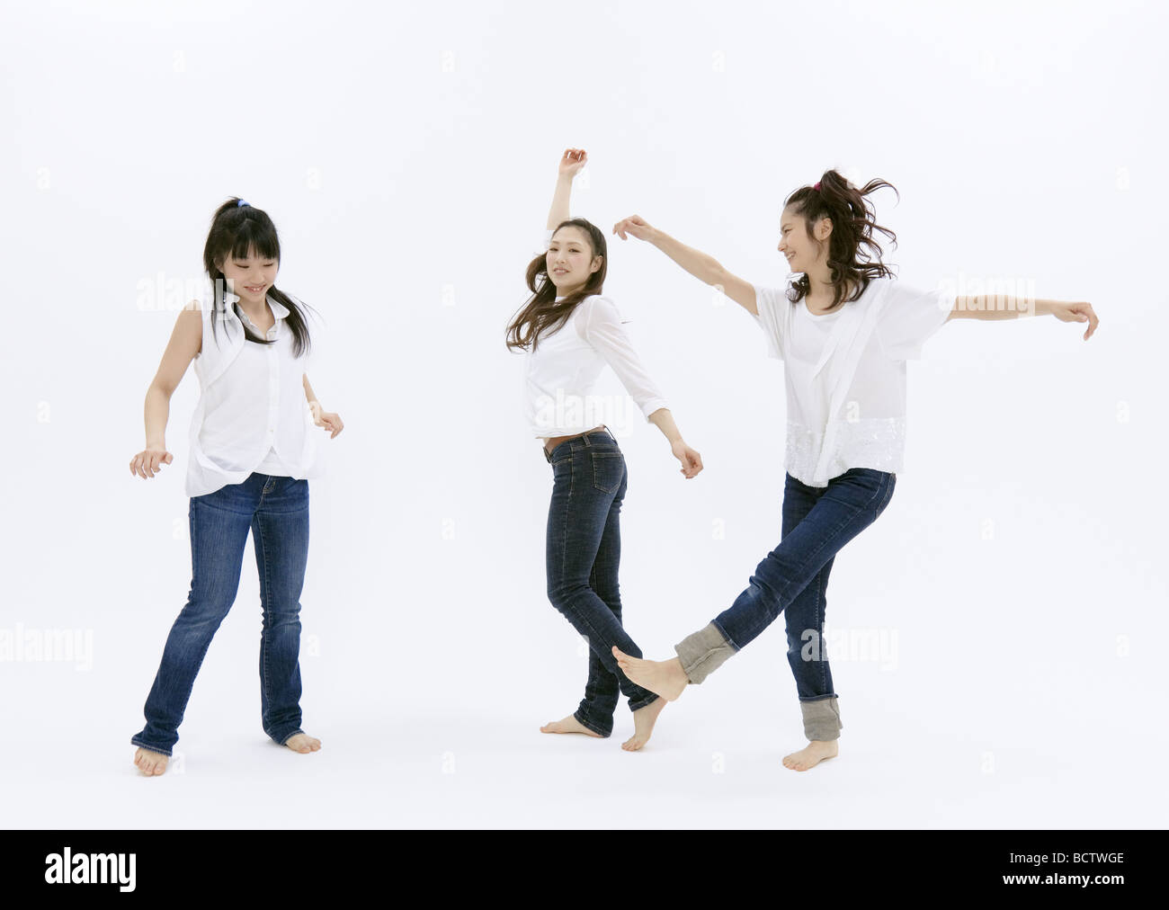 Young women dancing Stock Photo - Alamy