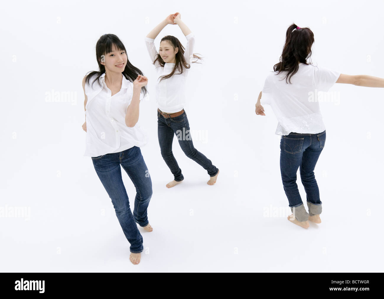 Young women dancing Stock Photo - Alamy