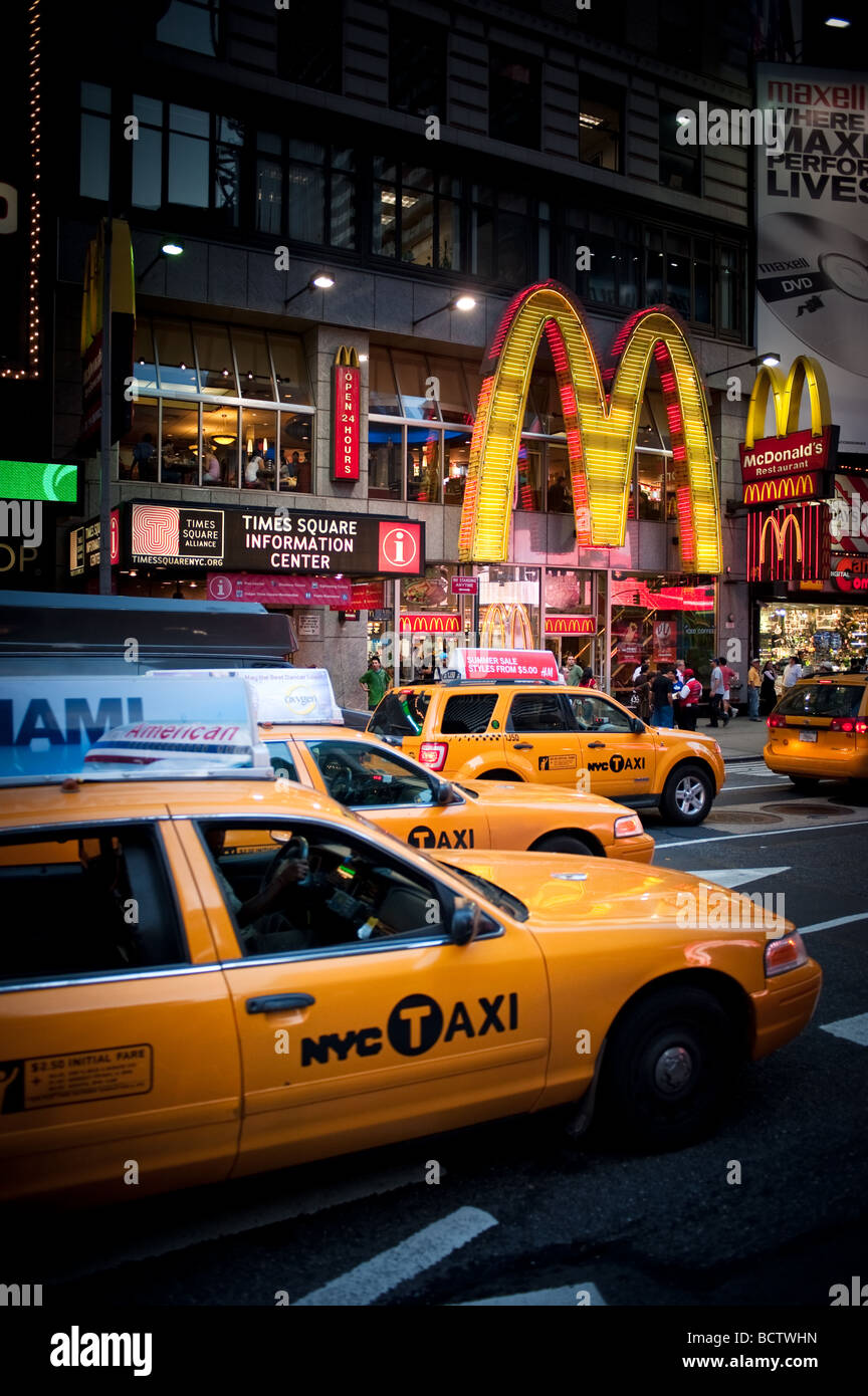 Times Square in New York City with McDonalds sign and yellow Taxi Cabs lined up in front Stock ...