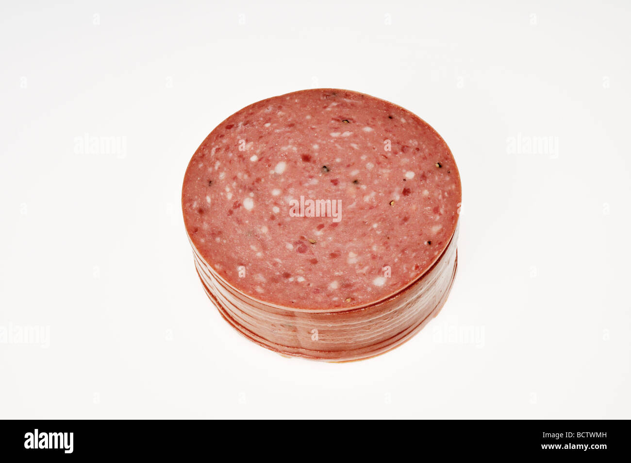 Stack of sliced salami deli meat isolated Stock Photo - Alamy