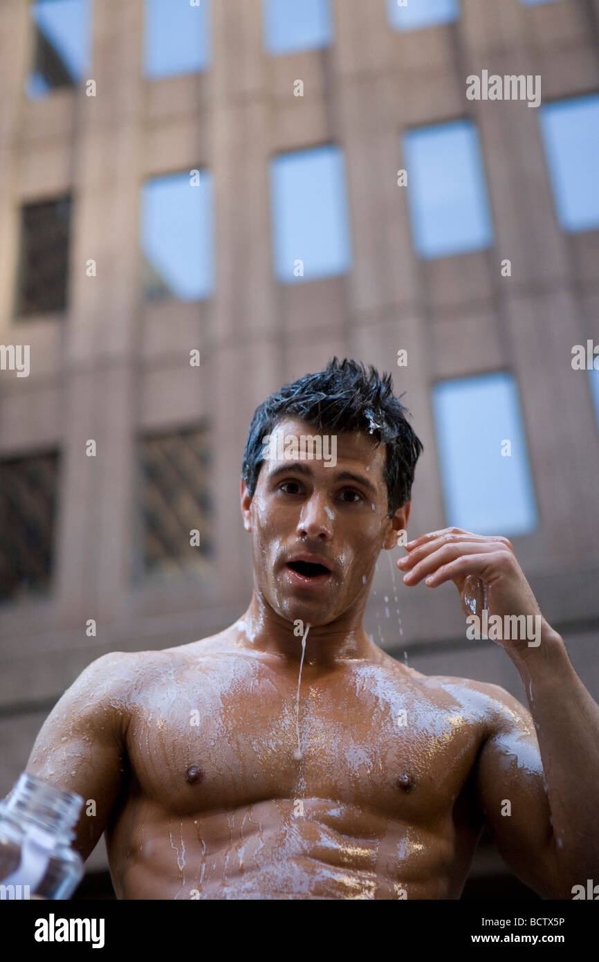 Portrait of a young man with water dripping from his face Stock Photo ...