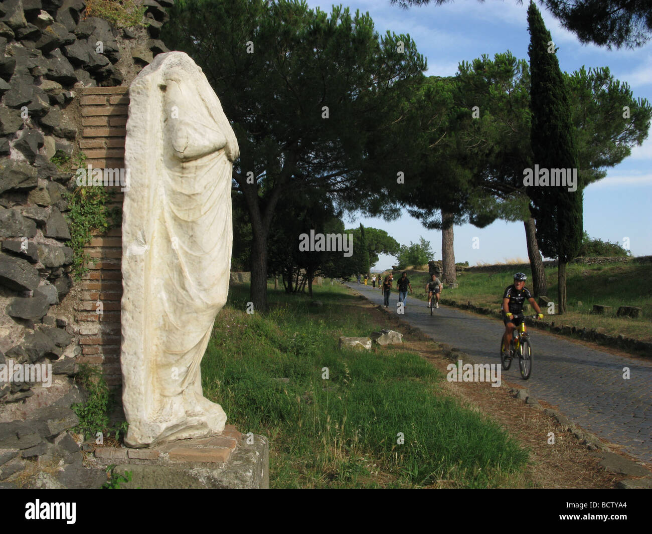 old roman statue on the old appian way in rome italy Stock Photo - Alamy