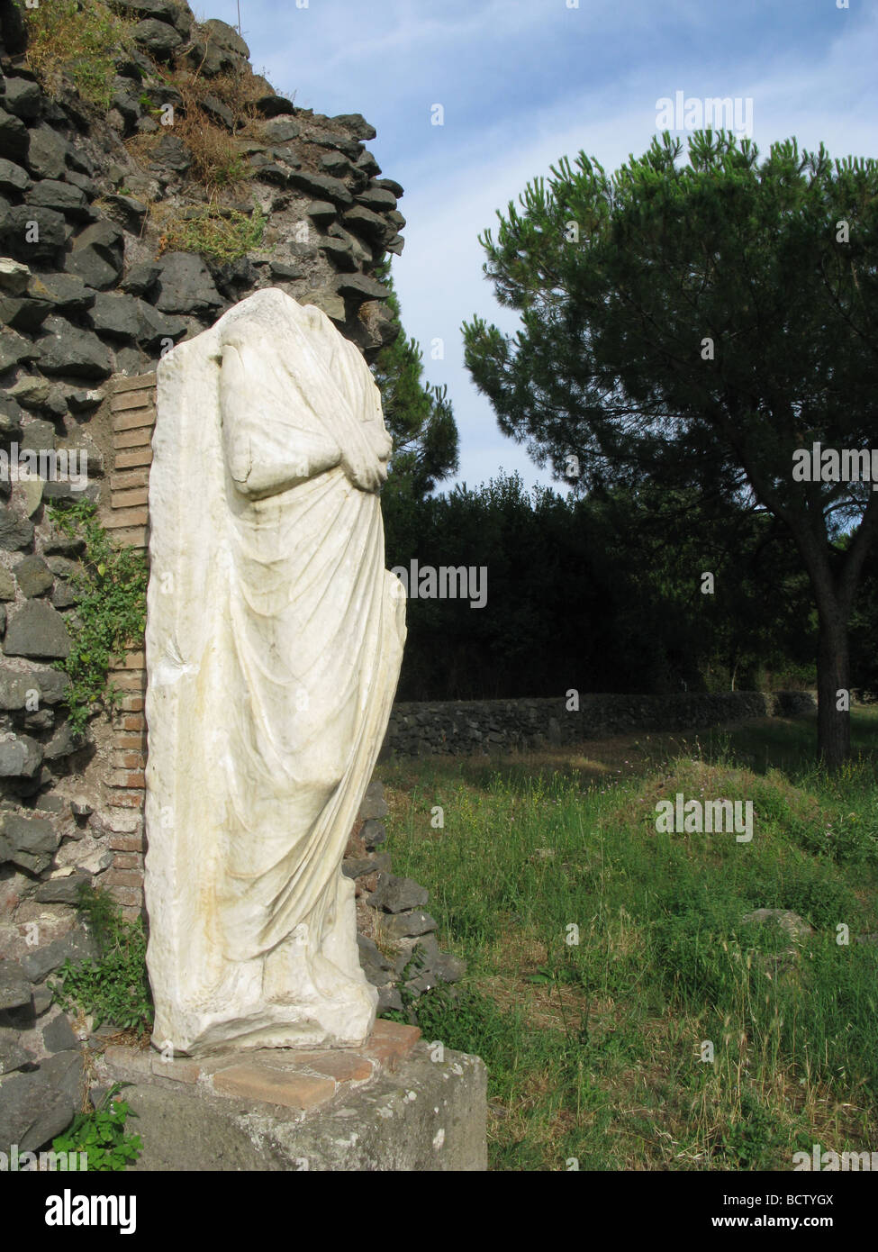 old roman statue on the old appian way in rome italy Stock Photo - Alamy