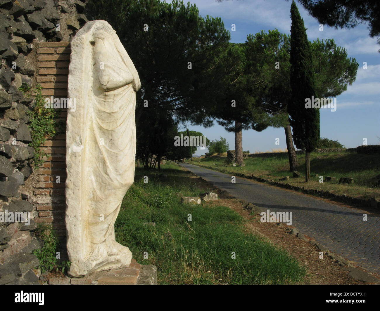 old roman statue on the old appian way in rome italy Stock Photo - Alamy