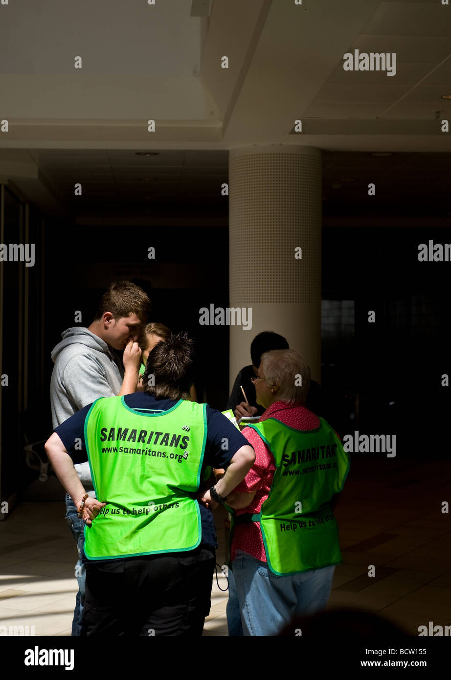 Volunteers from the charity The Samaritans talking to members of the ...