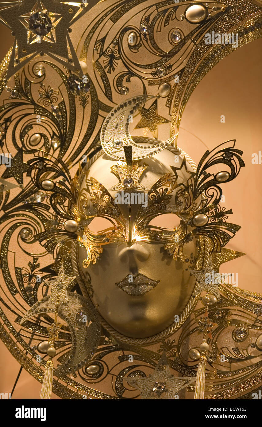 moon-mask from venice in gold Stock Photo - Alamy