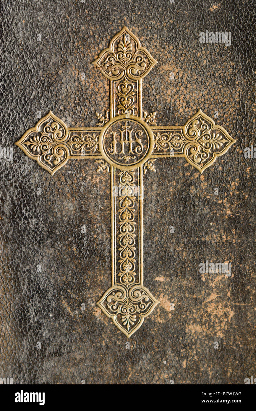 cross on the old book Stock Photo - Alamy