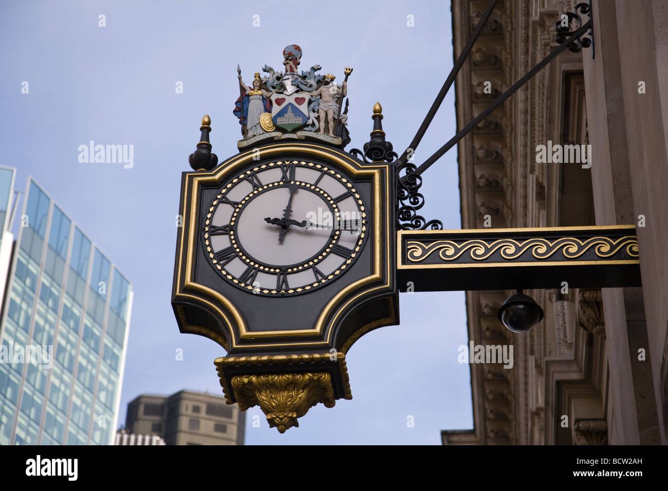 One of two clocks on the outside of the Royal Exchange in the City of ...