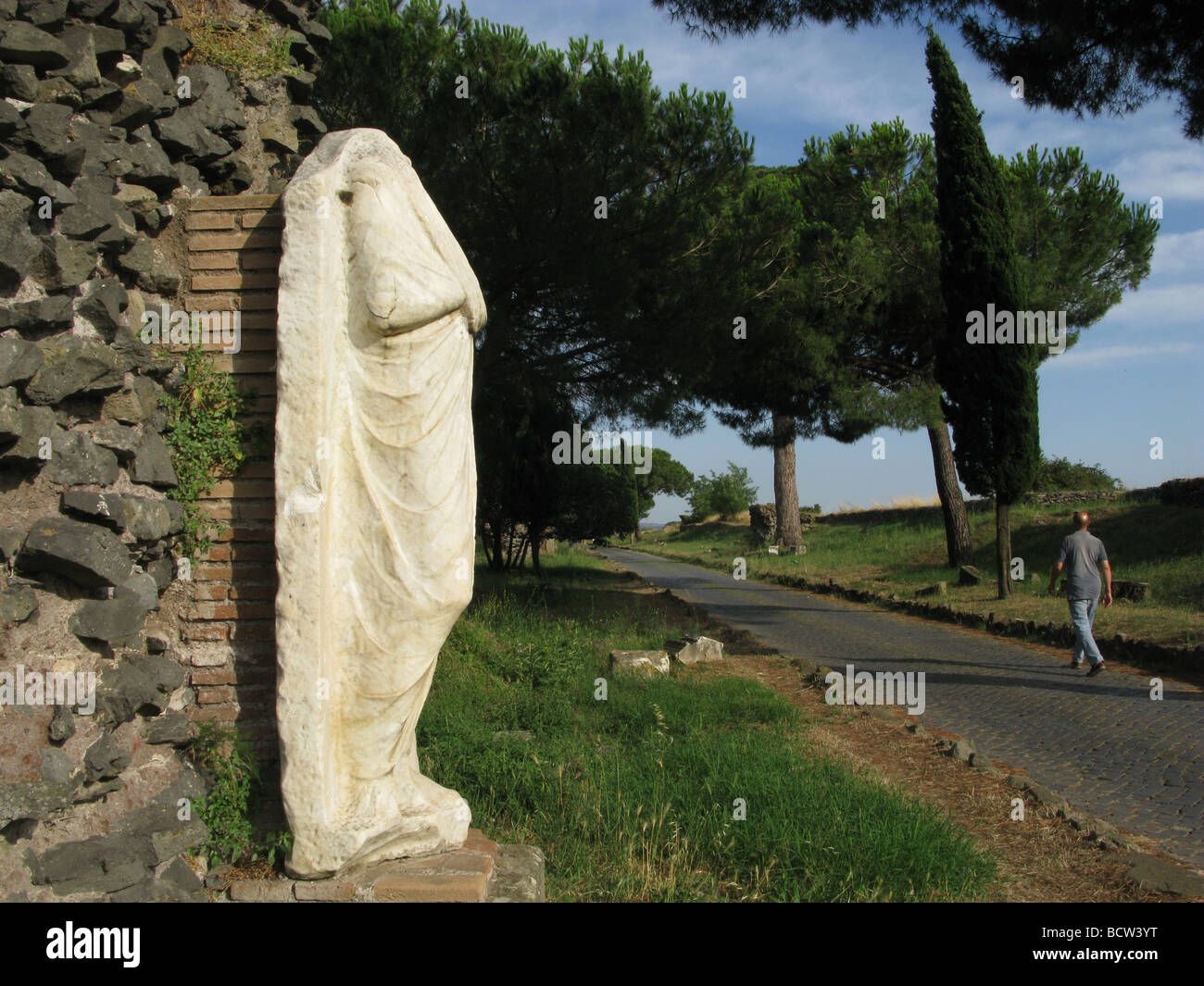 old roman statue on the old appian way in rome italy Stock Photo - Alamy