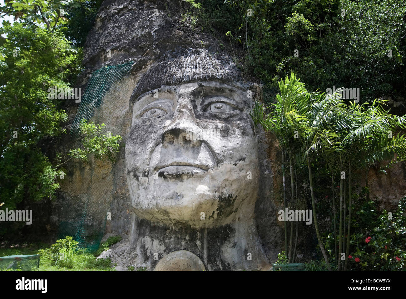 Close-up of a statue carved on a rock, Isabela, Puerto Rico Stock Photo ...