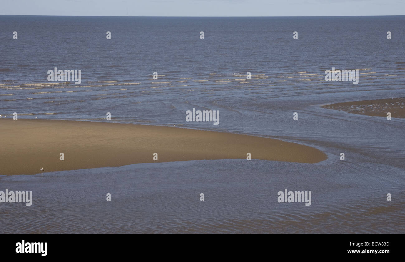 Water ebbing back into the sea on Blackpool Beach Stock Photo - Alamy