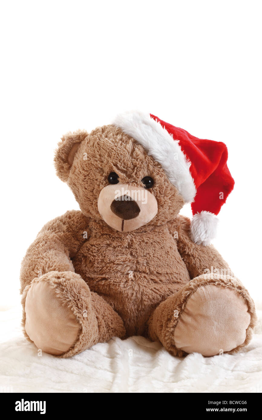 Teddy bear with Christmas hat Stock Photo - Alamy