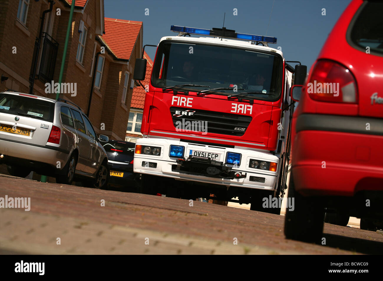 A fire engine on the way to a call Stock Photo - Alamy