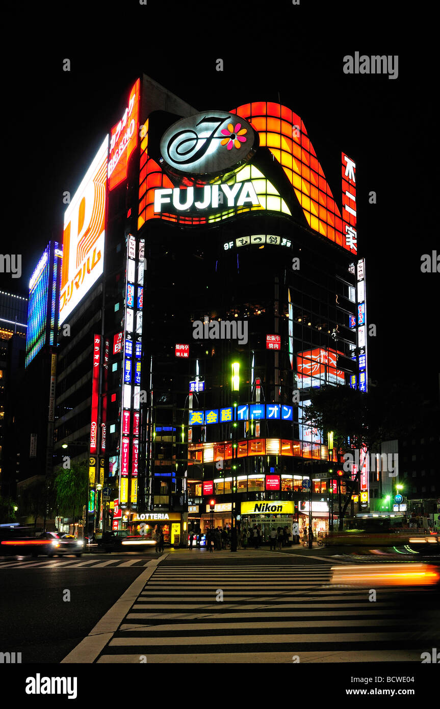 Colourful shop fronts and advertisements screens in Ginza district ...