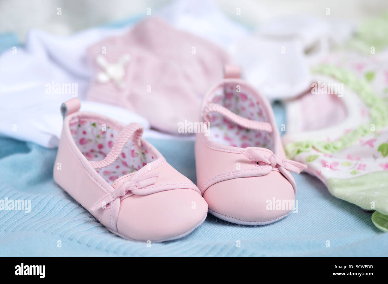 Adorable pink baby girl booties Stock Photo - Alamy