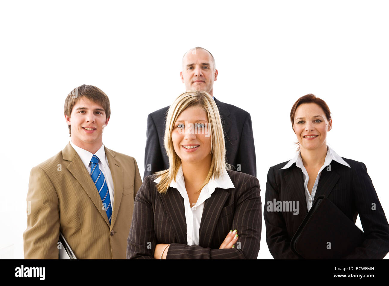 Successful team, two men and two women Stock Photo - Alamy