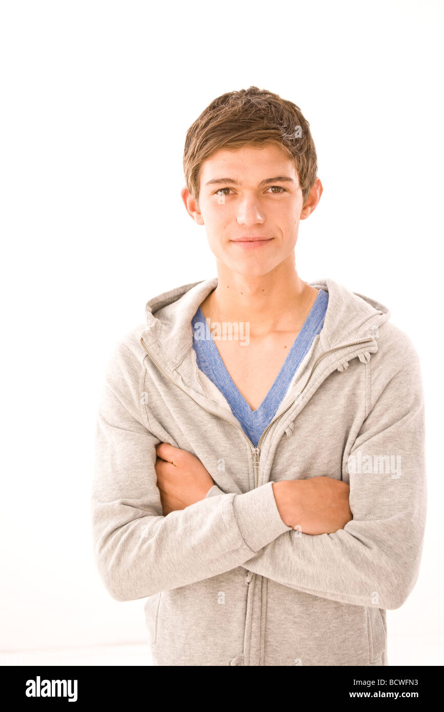 Portrait of a boy with folded arms Stock Photo - Alamy