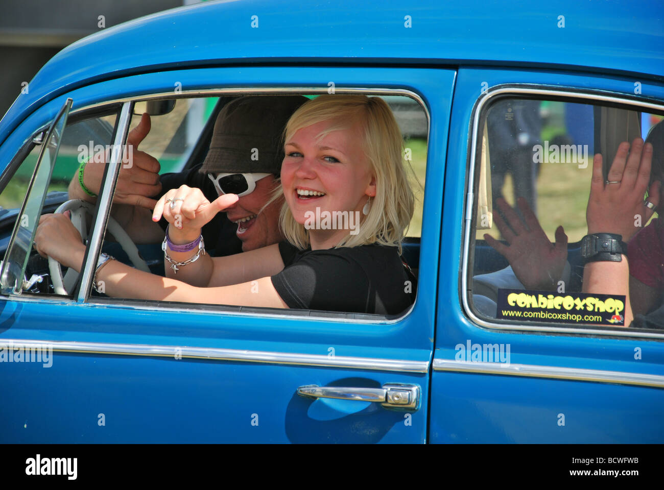 Classic VW beetle with young woman behind the wheel Stock Photo - Alamy