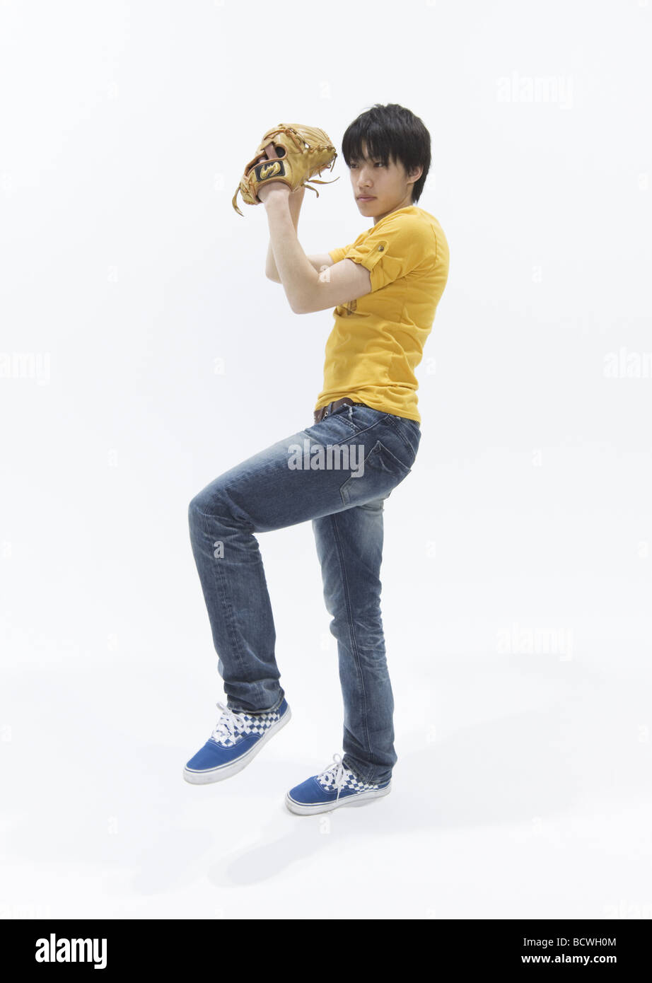 Man playing baseball Cut Out Stock Images & Pictures - Alamy