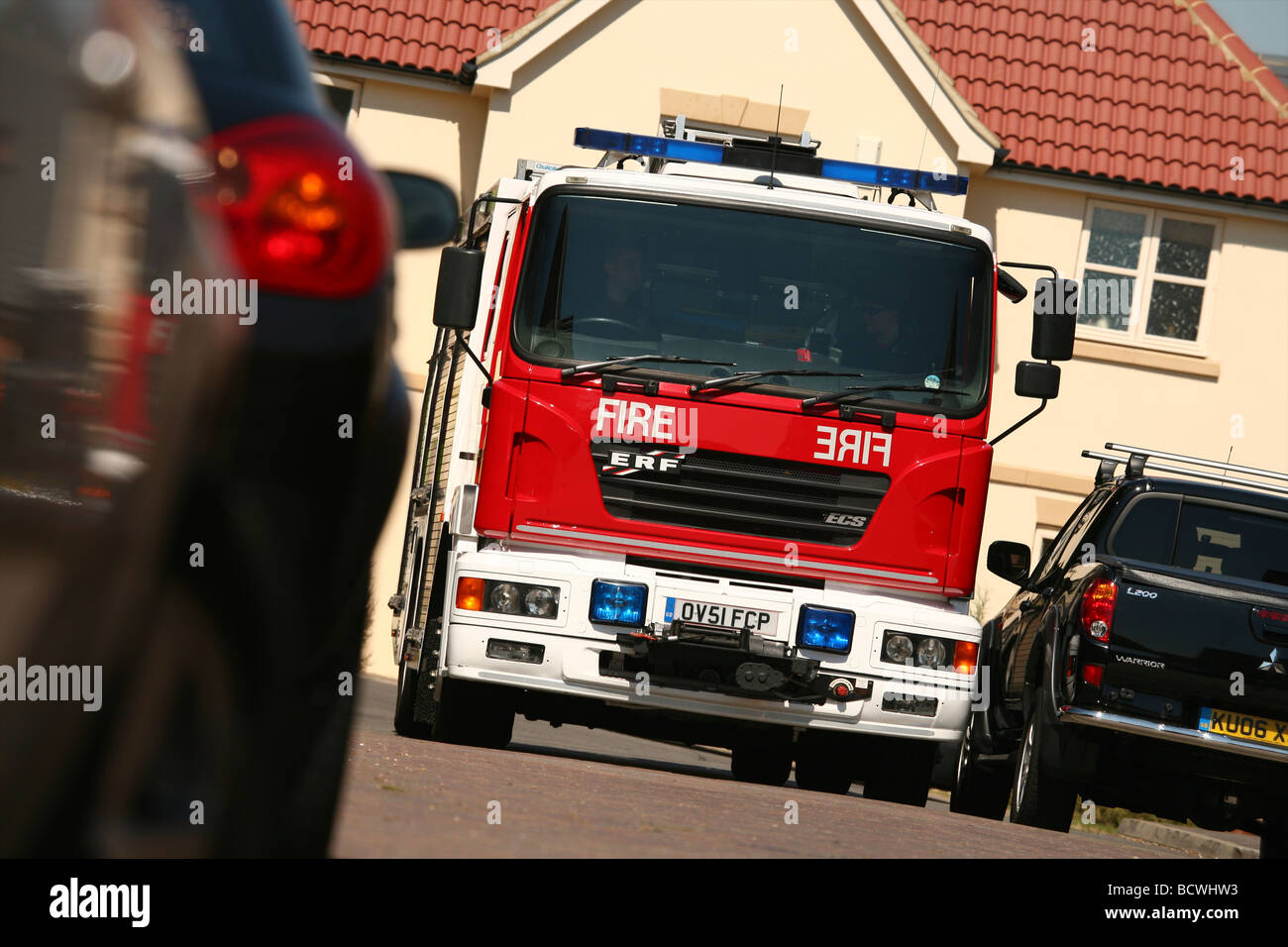A fire engine on the way to a call Stock Photo - Alamy