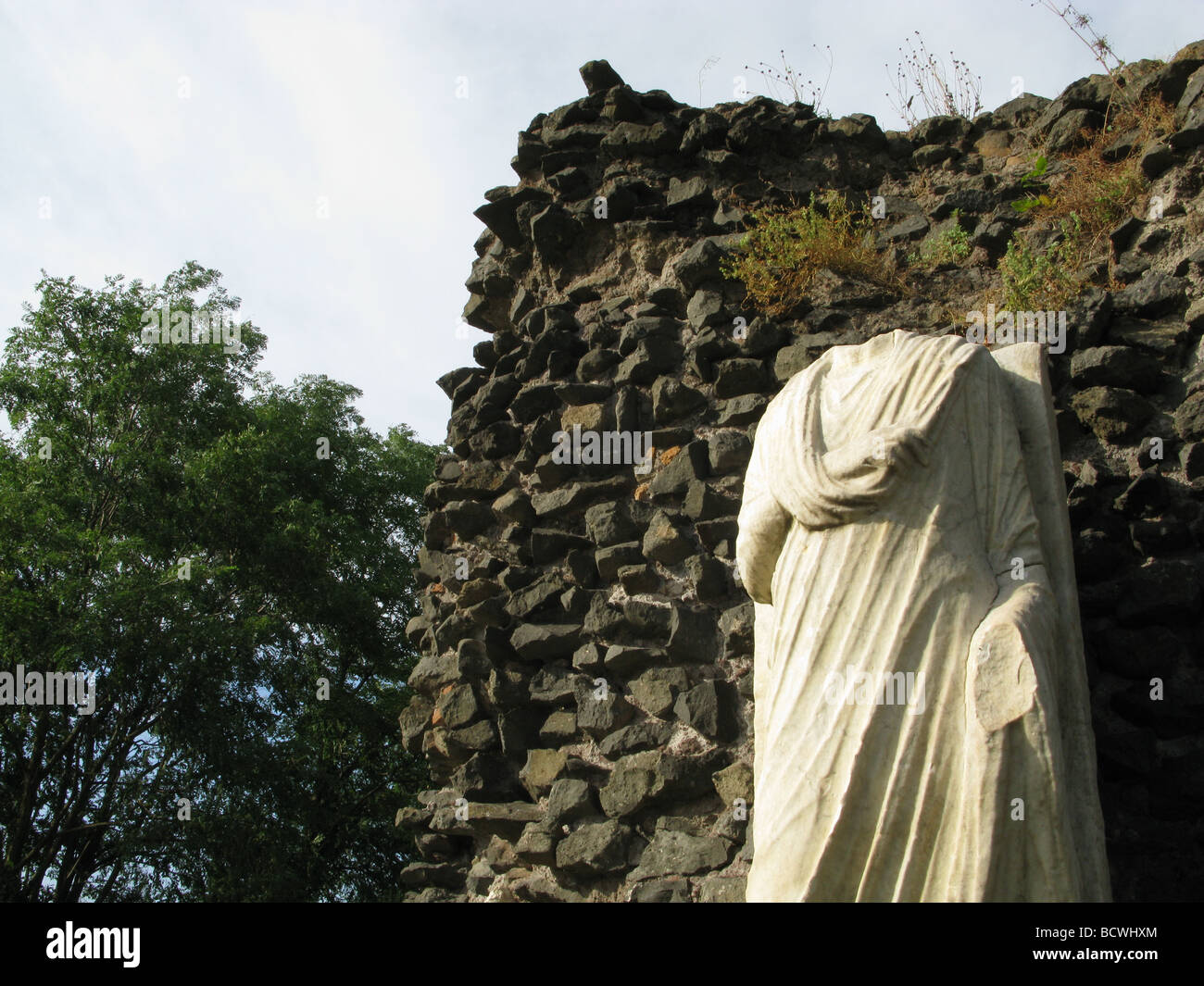 old roman statue on the old appian way in rome italy Stock Photo - Alamy